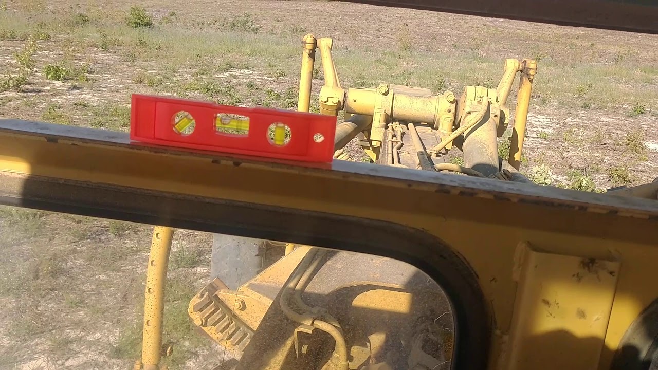 Grading a slope with a level - YouTube