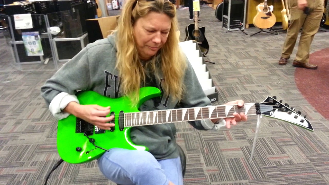 Lisa at Guitar Center with Jackson - YouTube