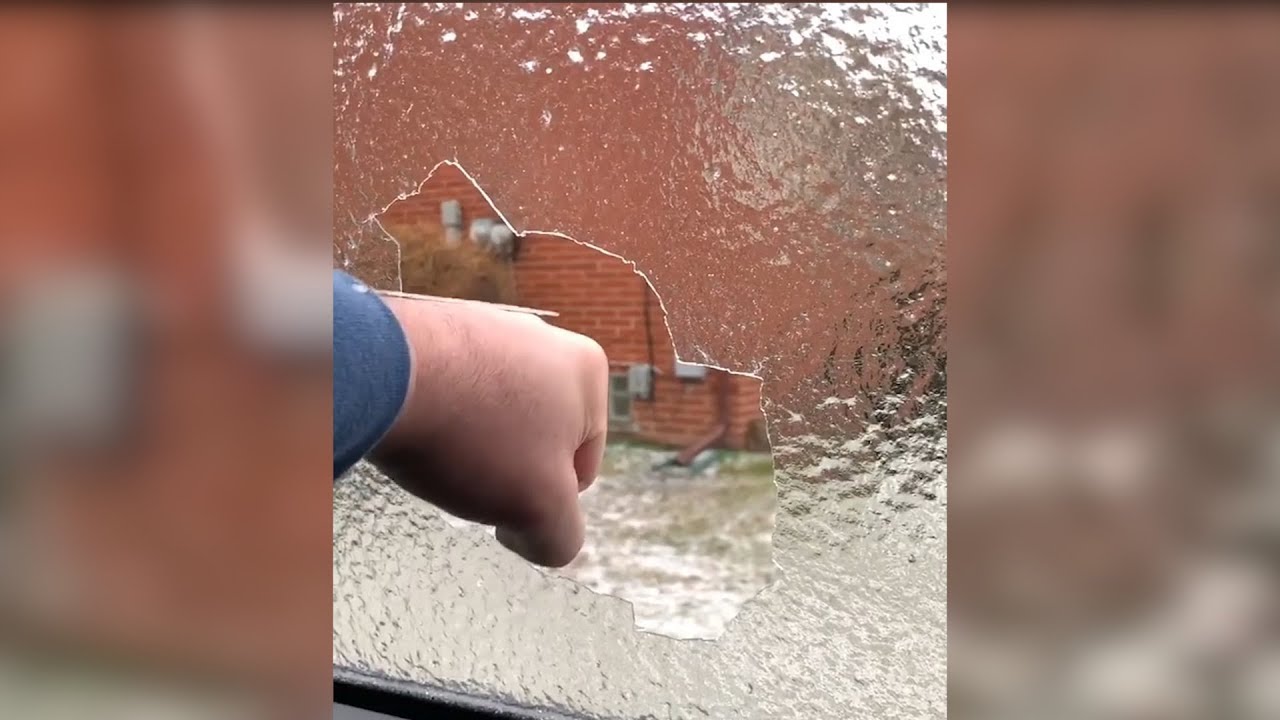 Punching through ice windows on cars - YouTube