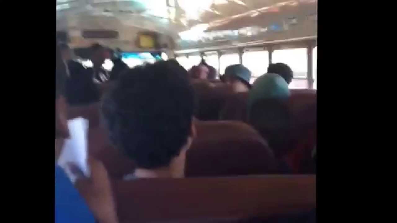 Fight on school bus - YouTube