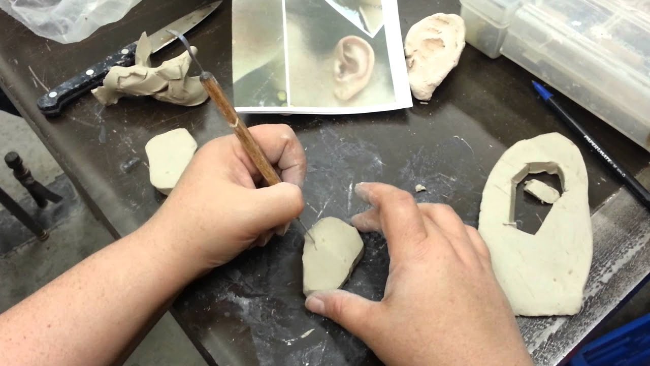 Sculpting an ear in clay - YouTube