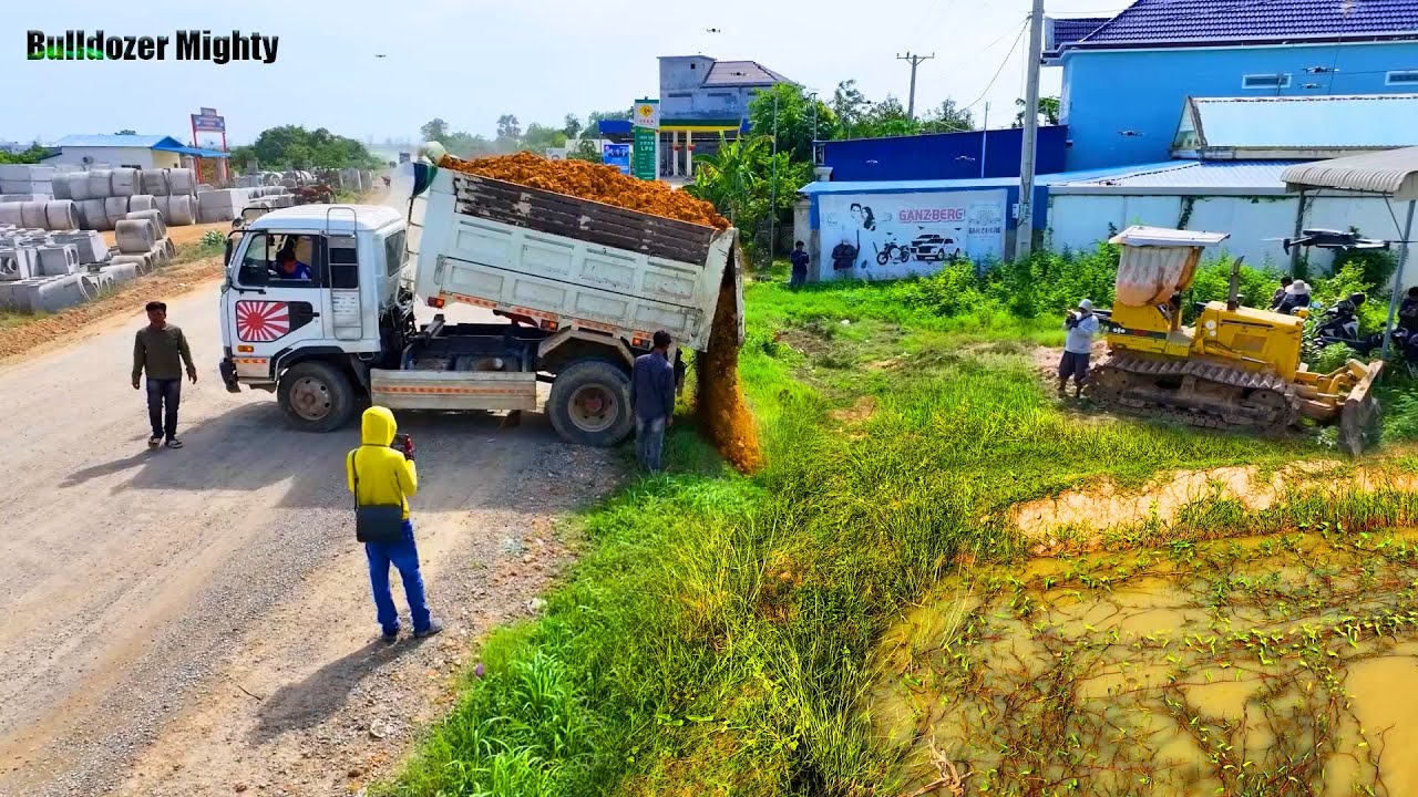 The first Dump Truck, Filling Up The Land, Bulldozer KOMATSU D31P, Dump ...