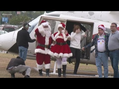 Santa takes helicopter to Northline Commons mall - YouTube