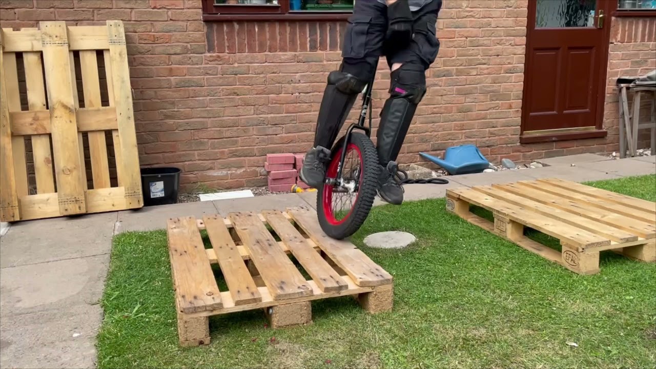 Trials Unicyclist Fails a Two Pallets Gap Then Falls - YouTube