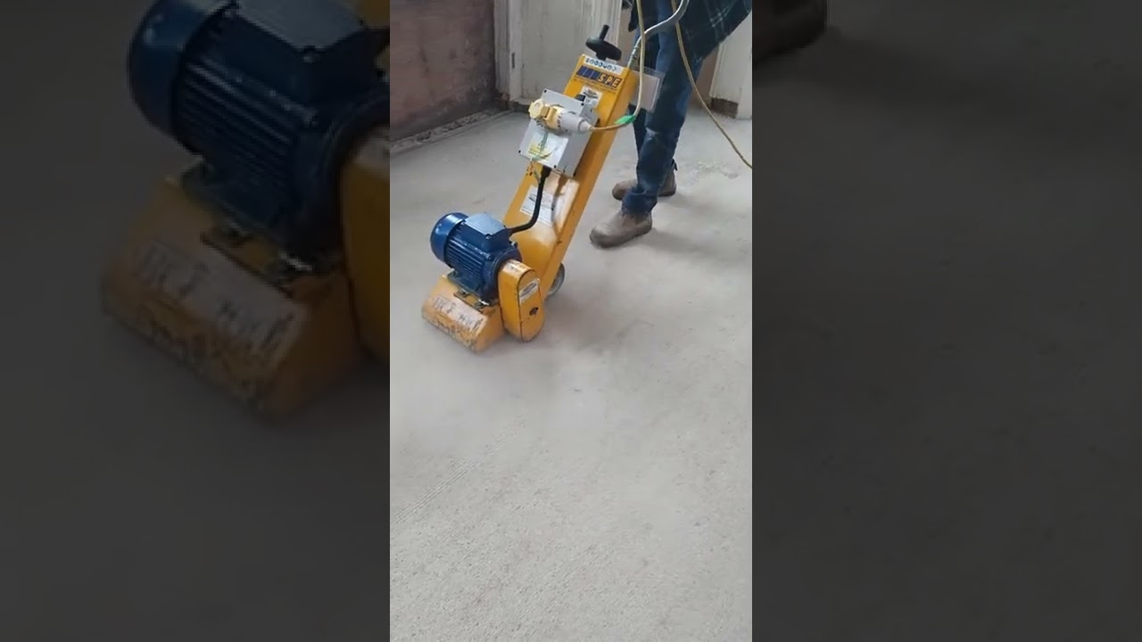 Bef200 110v floor scabbler fitted with tct cutters on screed floor ...