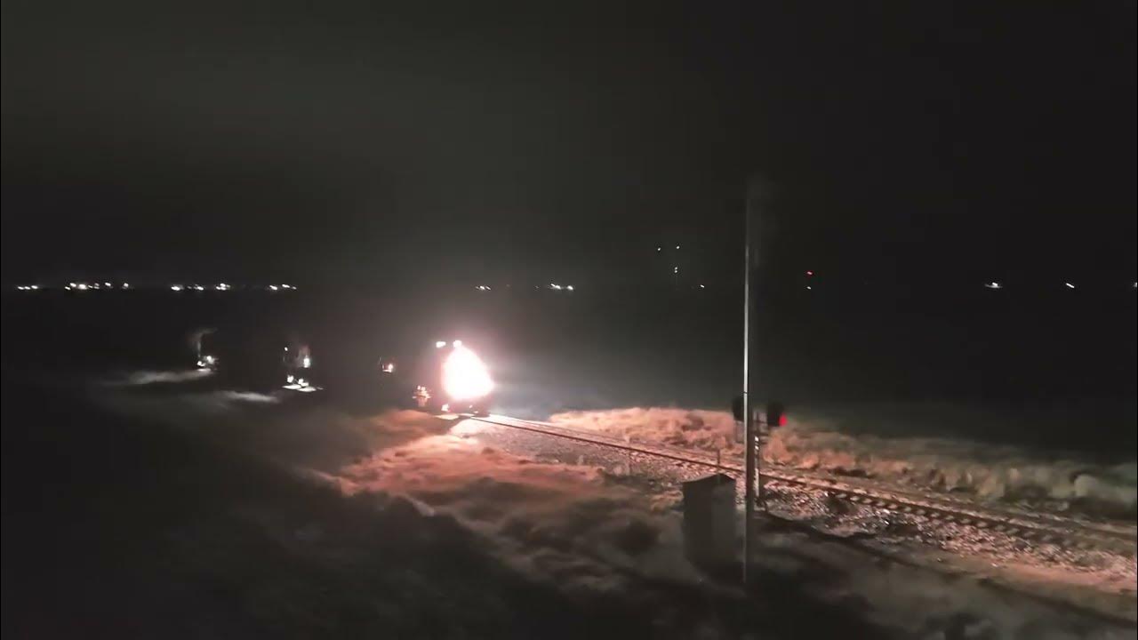 Drone video of southbound UP tanker train at night on the Spine Line - YouTube