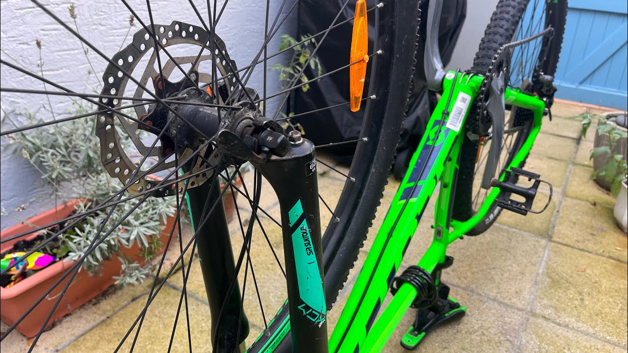 How to remove and install a Quick Release Bicycle front wheel - YouTube