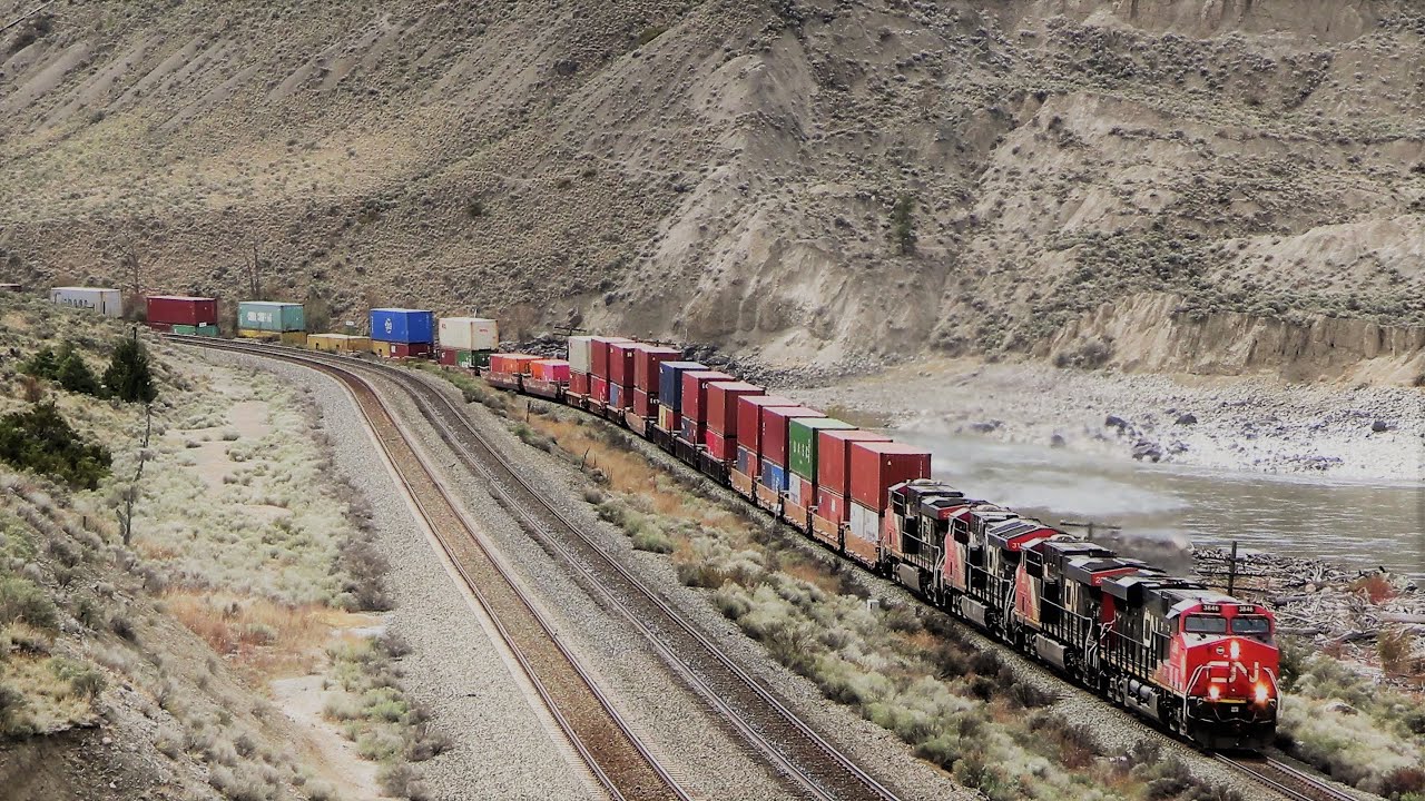 4K! Long Canadian National Intermodal Train with four Locomotives ...