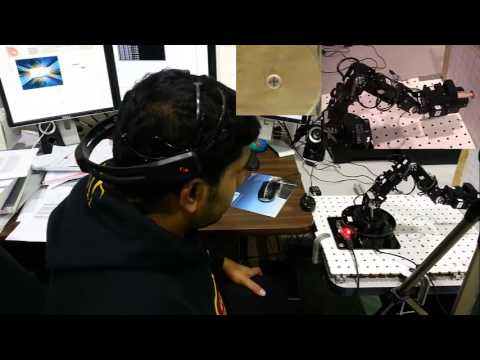 Thought or mind controlled multi-axis robot performs precision task ...