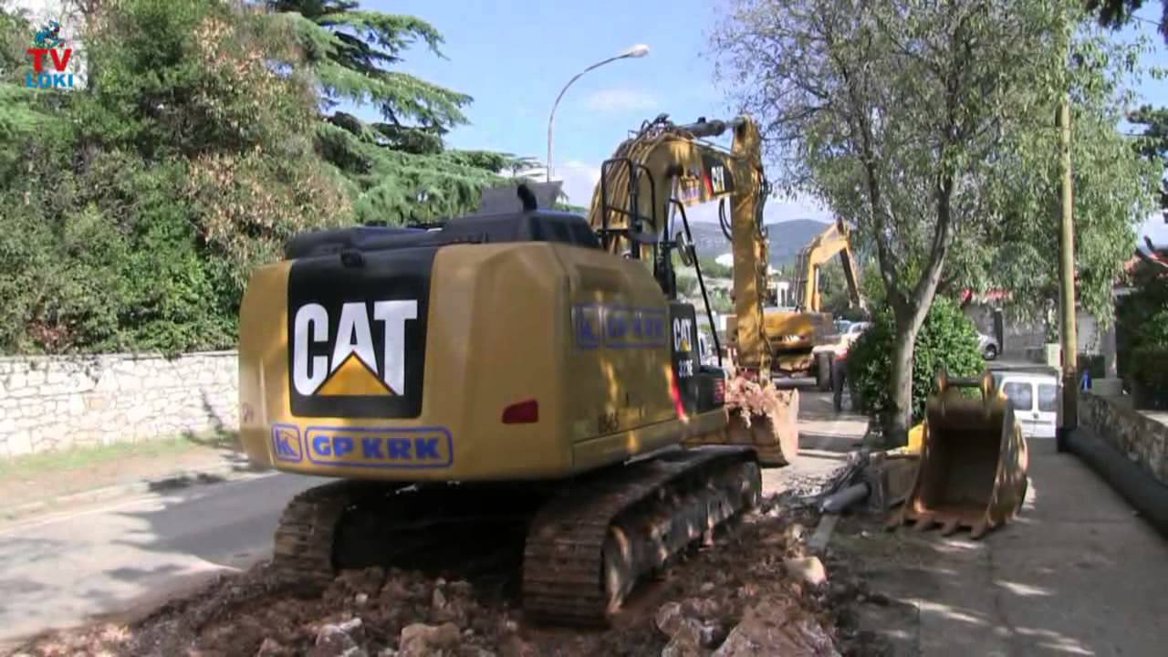 CAT 323E - YouTube