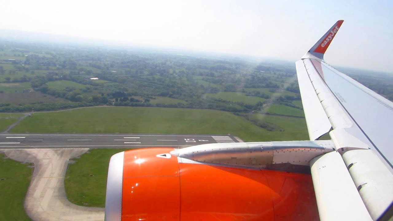ONBOARD Easyjet A320SL Wing View Landing at Manchester Airport Runway ...