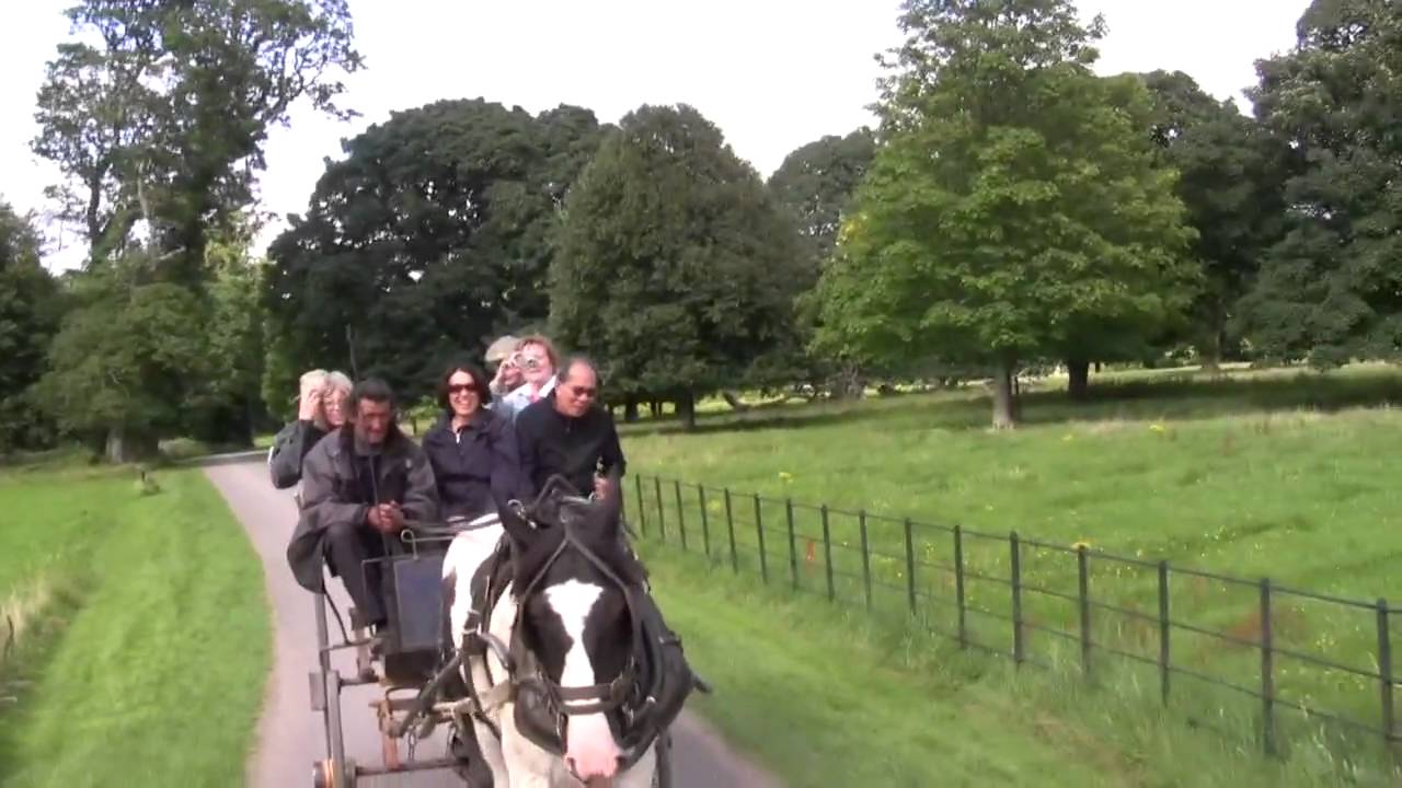 getourBrit - Jaunting Carts in Killarney with the Muckross House. - YouTube