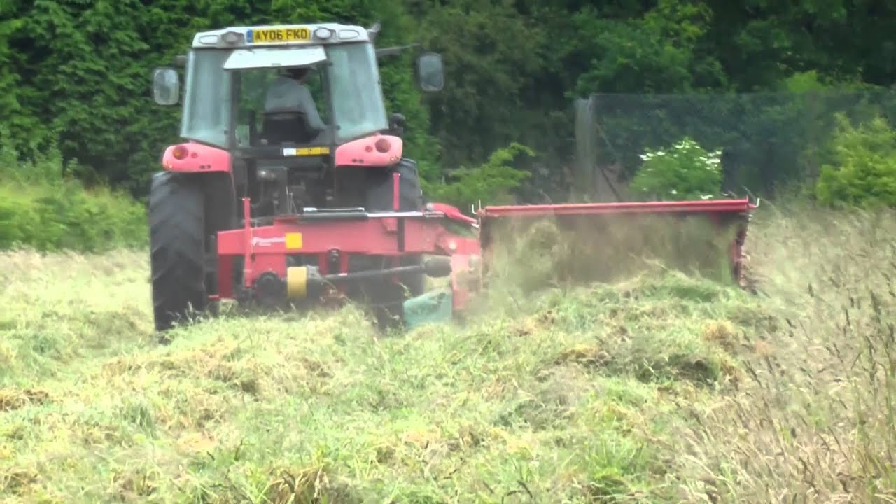MF 5460 mowing with Kverneland Taarup Mower - YouTube
