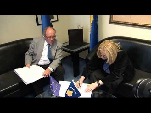 Andy Sparkes and EditaTahiri handover Civil Registry - YouTube