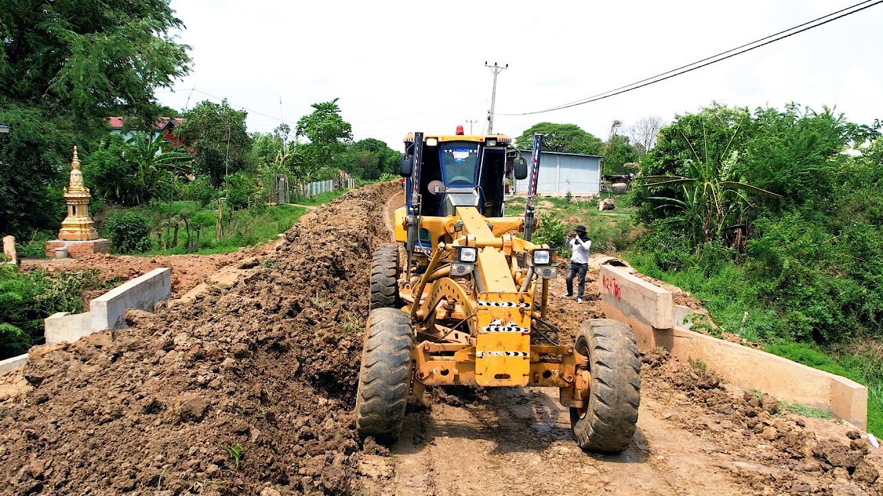 Techniques For Building New Road Foundations Using Clay. Skilled Driver ...