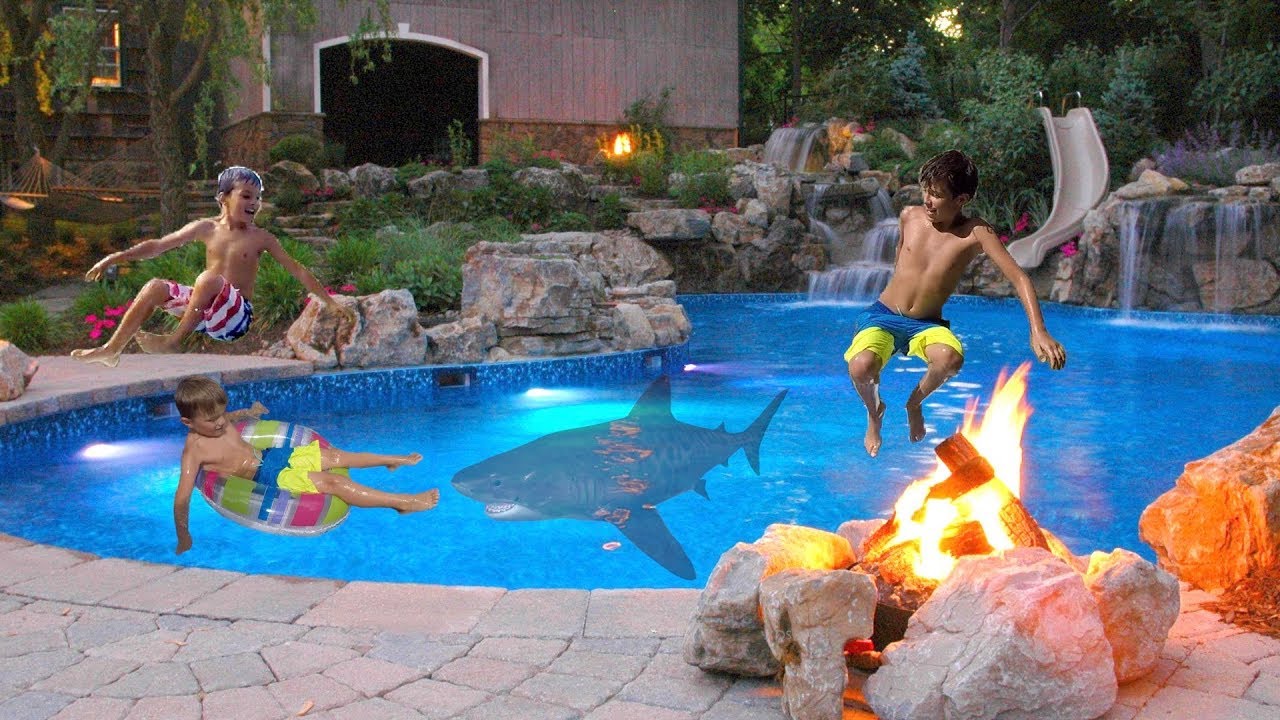 🏊 WE FOUND A SHARK IN OUR BACKYARD POOL! 🦈 - YouTube