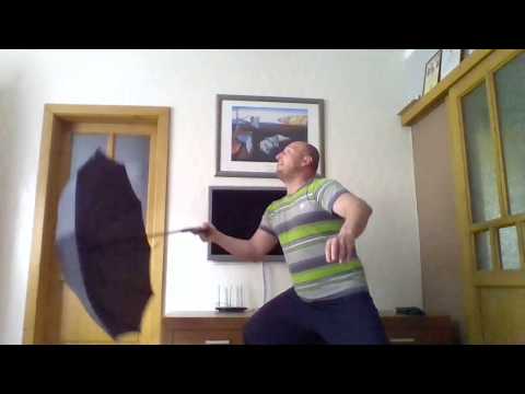 Most One-Handed Open Umbrella Flips In 30 Seconds