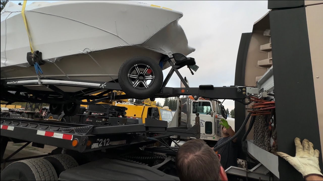 $300,000 boat used as a battering ram to our truck! Crane operator lost ...