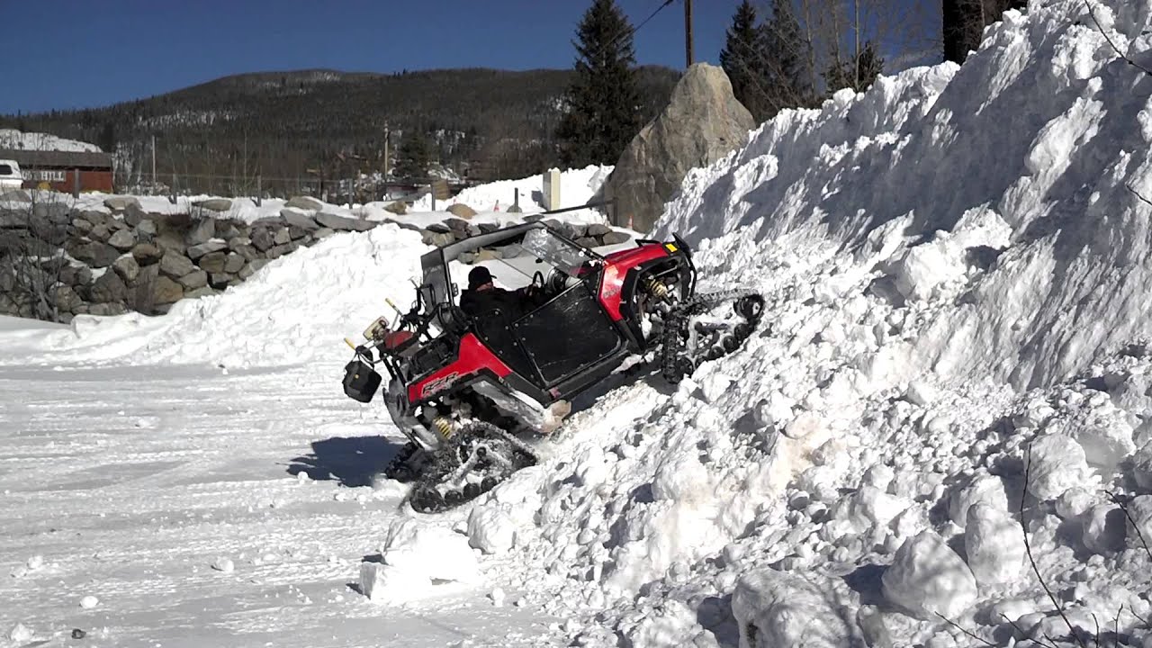 RZR with tracks can't climb everything. - YouTube