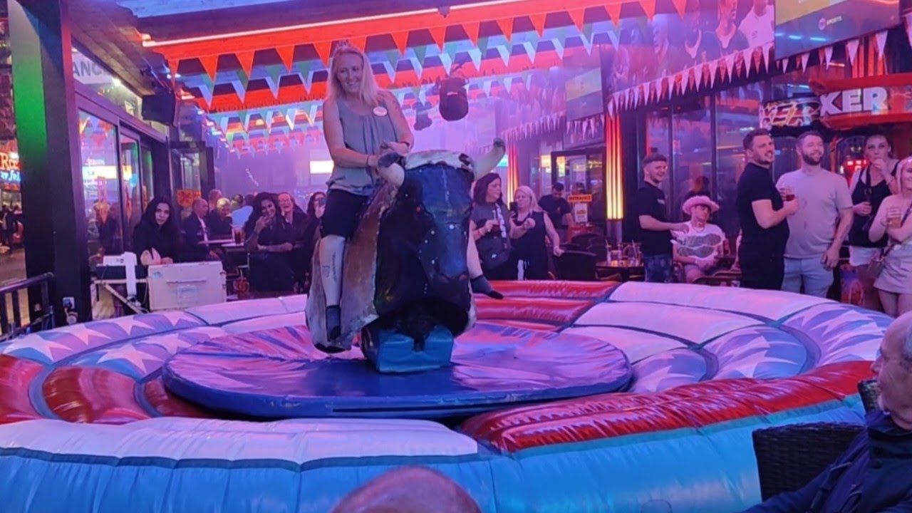 Mechanical bull riding December 17th 2023 in Benidorm - YouTube