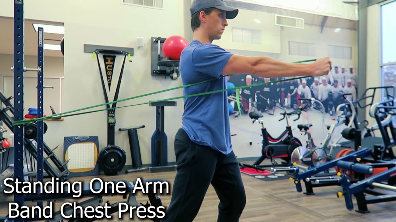 Standing One Arm Band Chest Press - YouTube