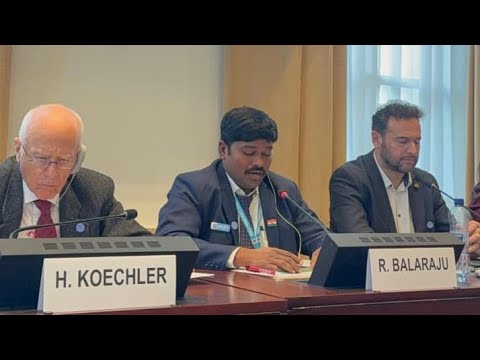 "Collaboration in action! A group of international delegates gathered ...