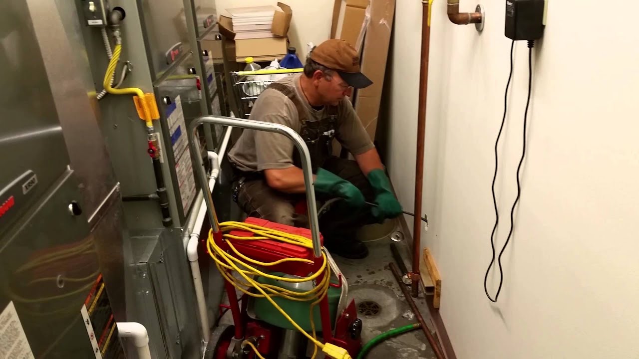 cabling a 2 inch drain line from a wall clean out. - YouTube