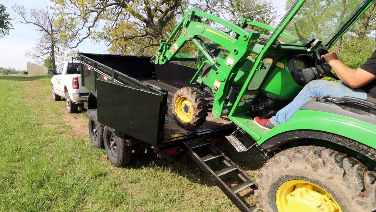 Hauling a Compact Tractor in a Dump Trailer - YouTube