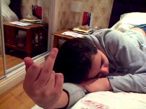 girl gets caught putting middle finger up