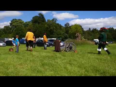 James helps to fire a Falconet cannon