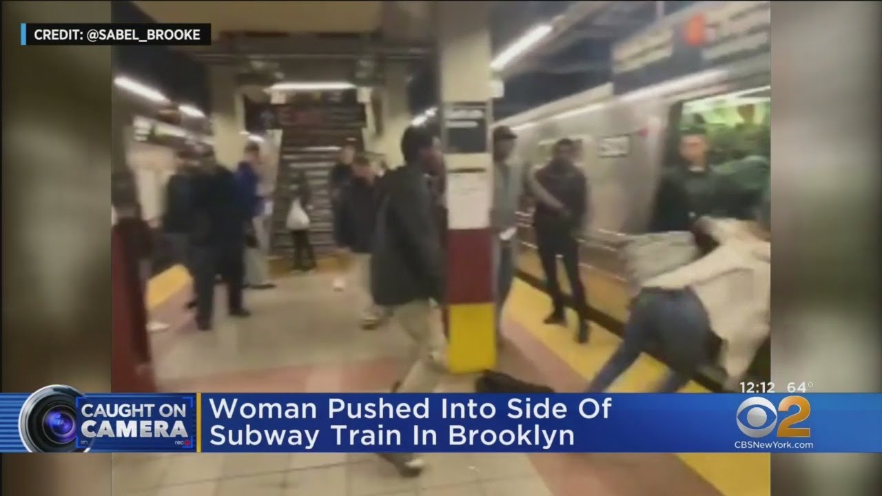 Woman Pushed Into Side Of Subway Train In Brooklyn - YouTube