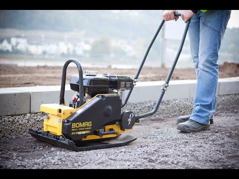 Levelling soft sand using Sand Compacting Machine - YouTube