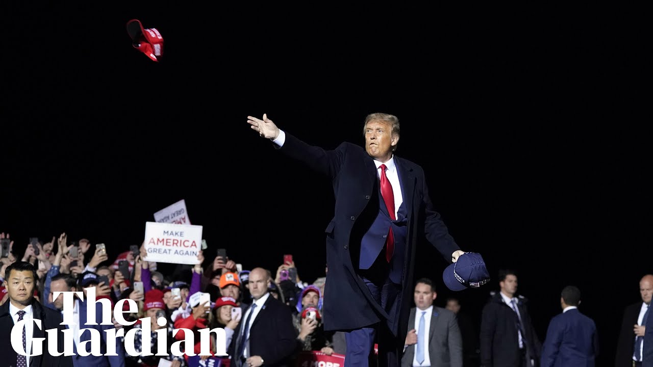 Trump throws baseball caps into crowd days before announcing positive ...