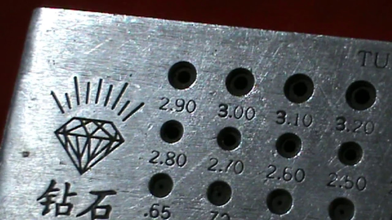 tungsten carbide draw plates for hand made gold - YouTube