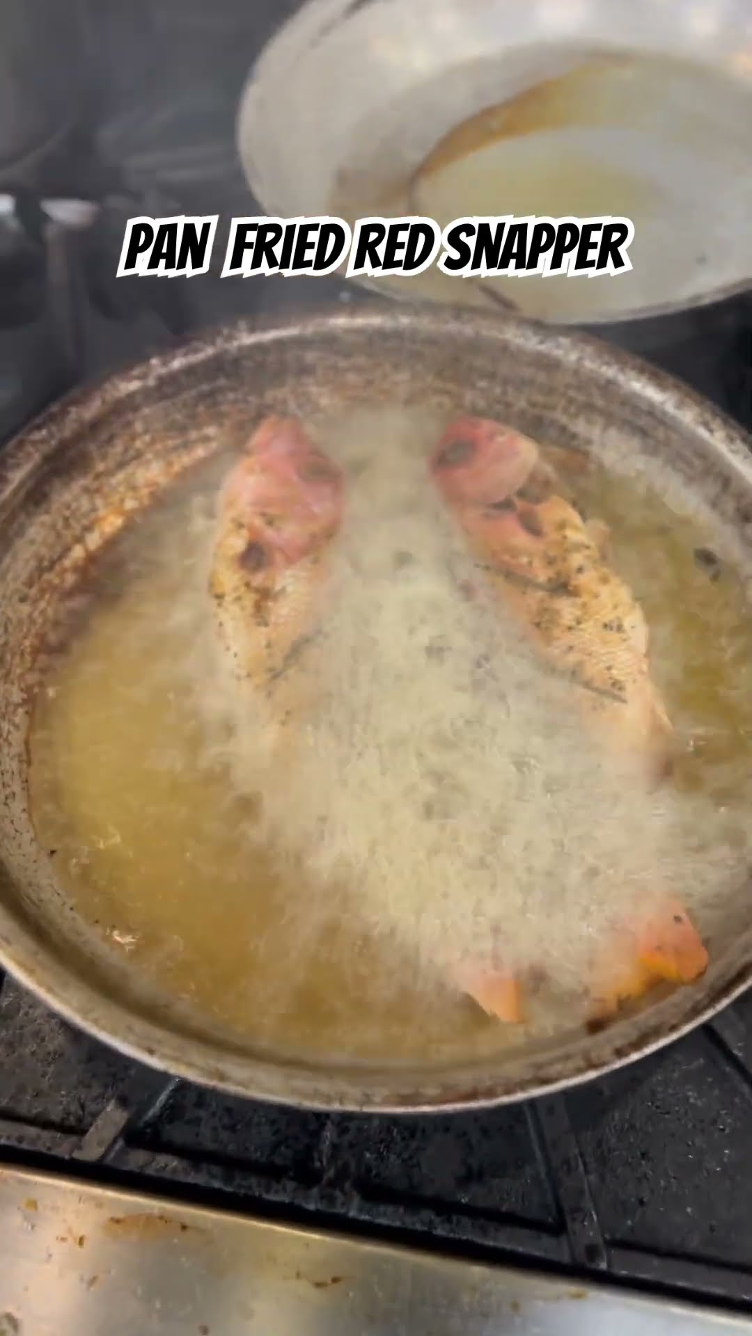 Golden, crispy pan-fried red snapper, perfectly seasoned and served ...