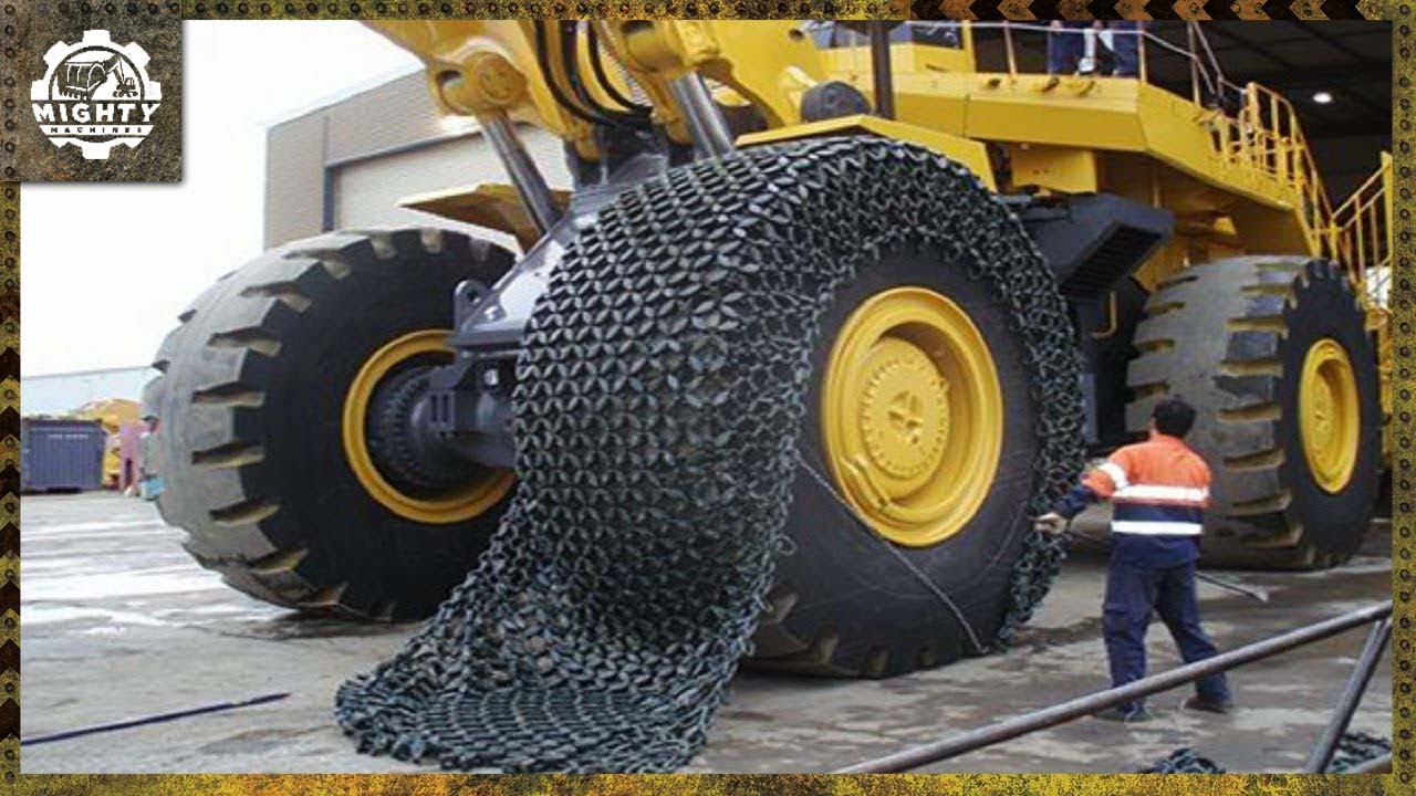 This Is How Chains Are installed on a $60,000 Extreme Mega Tyre - YouTube