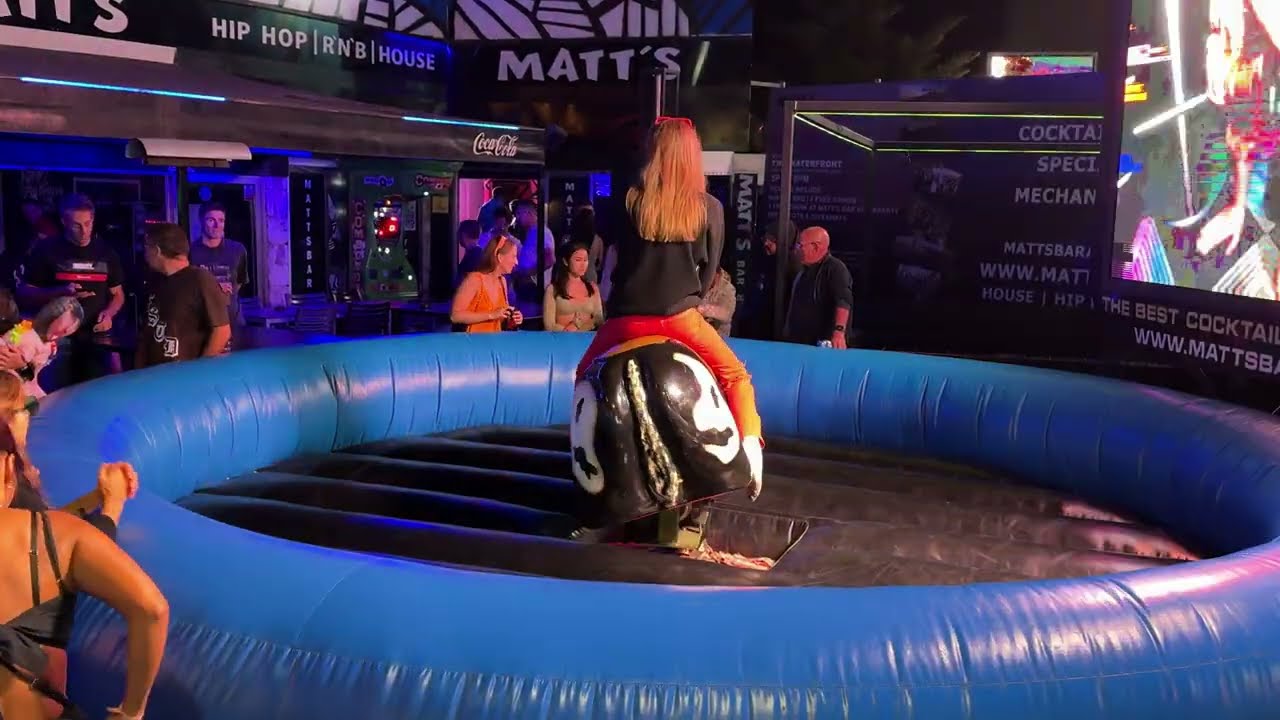 😲 PRETTY Girl Riding on a Bull in Benidorm 2024 😍 Mechanical Bull ...