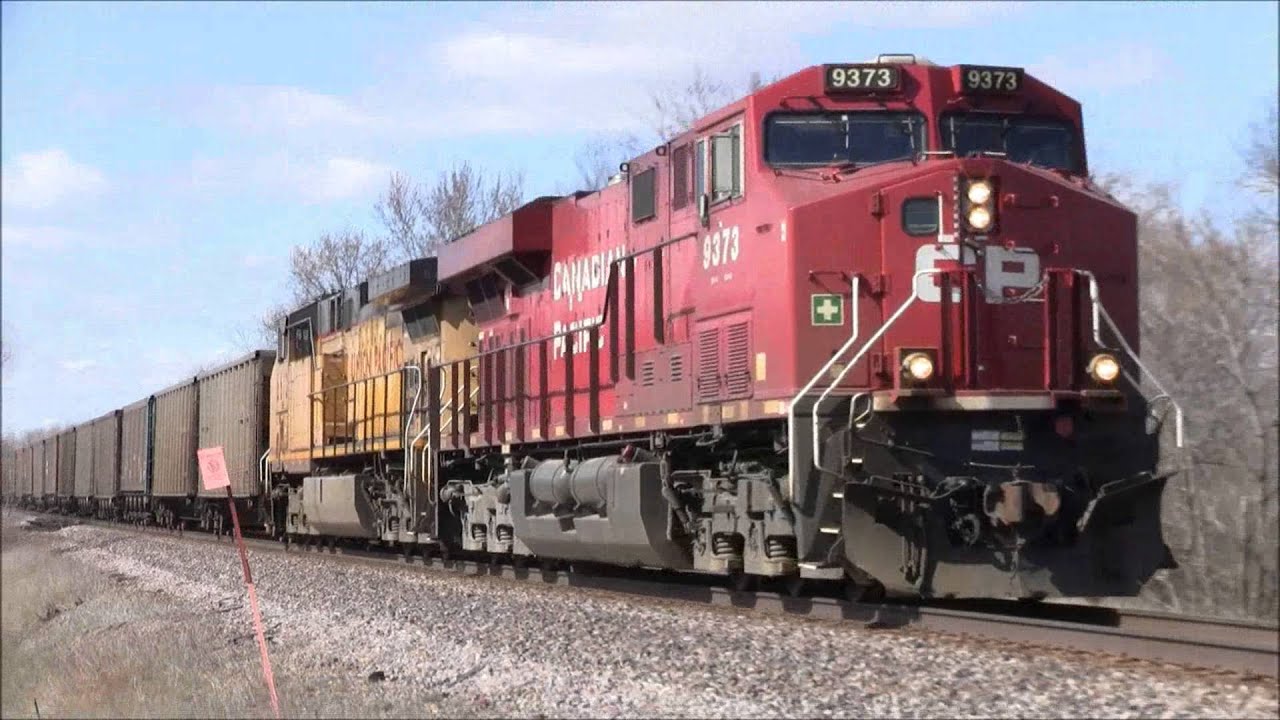 CP LEADER LEADING THE LOADED COKE TRAIN CP 9373 - YouTube