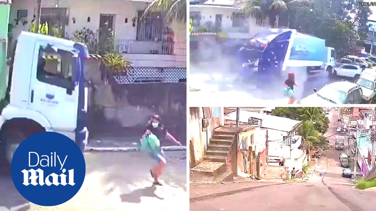 Out of control truck nearly hits pedestrian as it hurtles down hill and ...