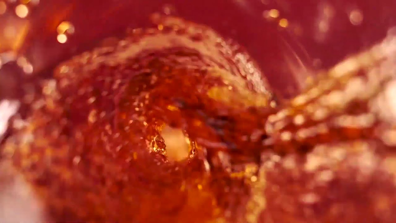 Soda coming out of a bottle seen from the inside - YouTube