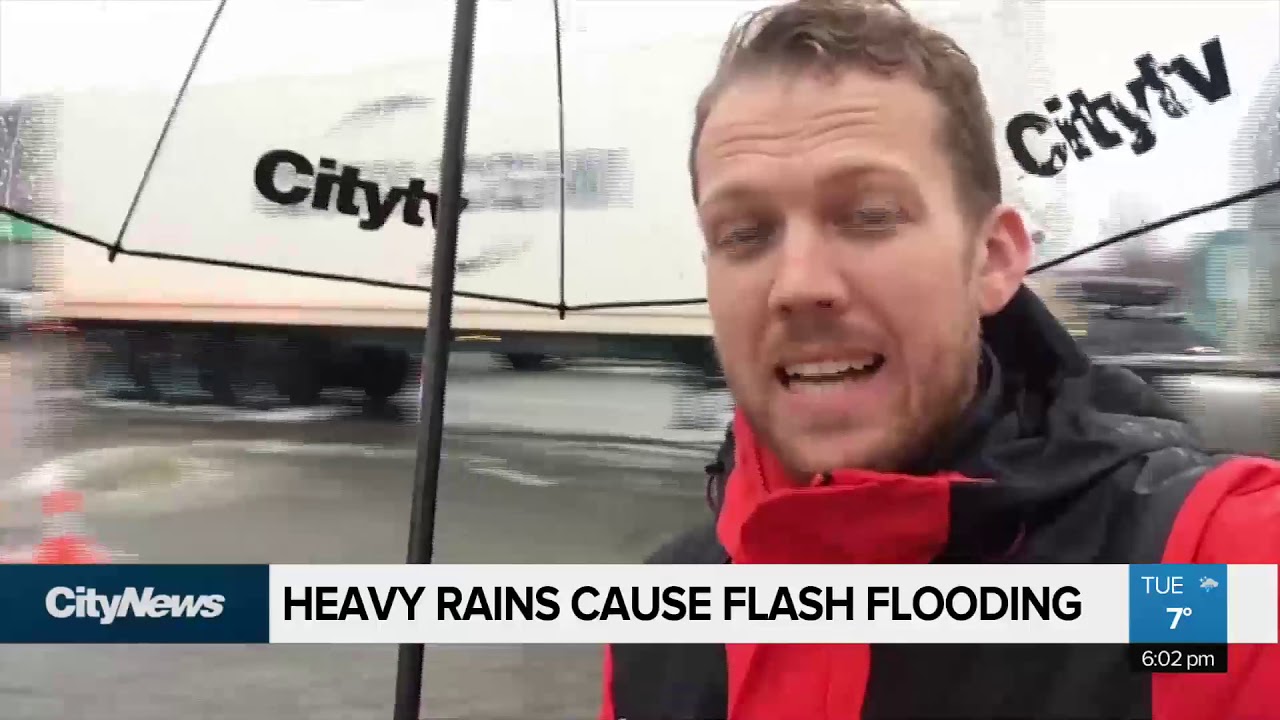 Heavy rain causes flash flooding - YouTube