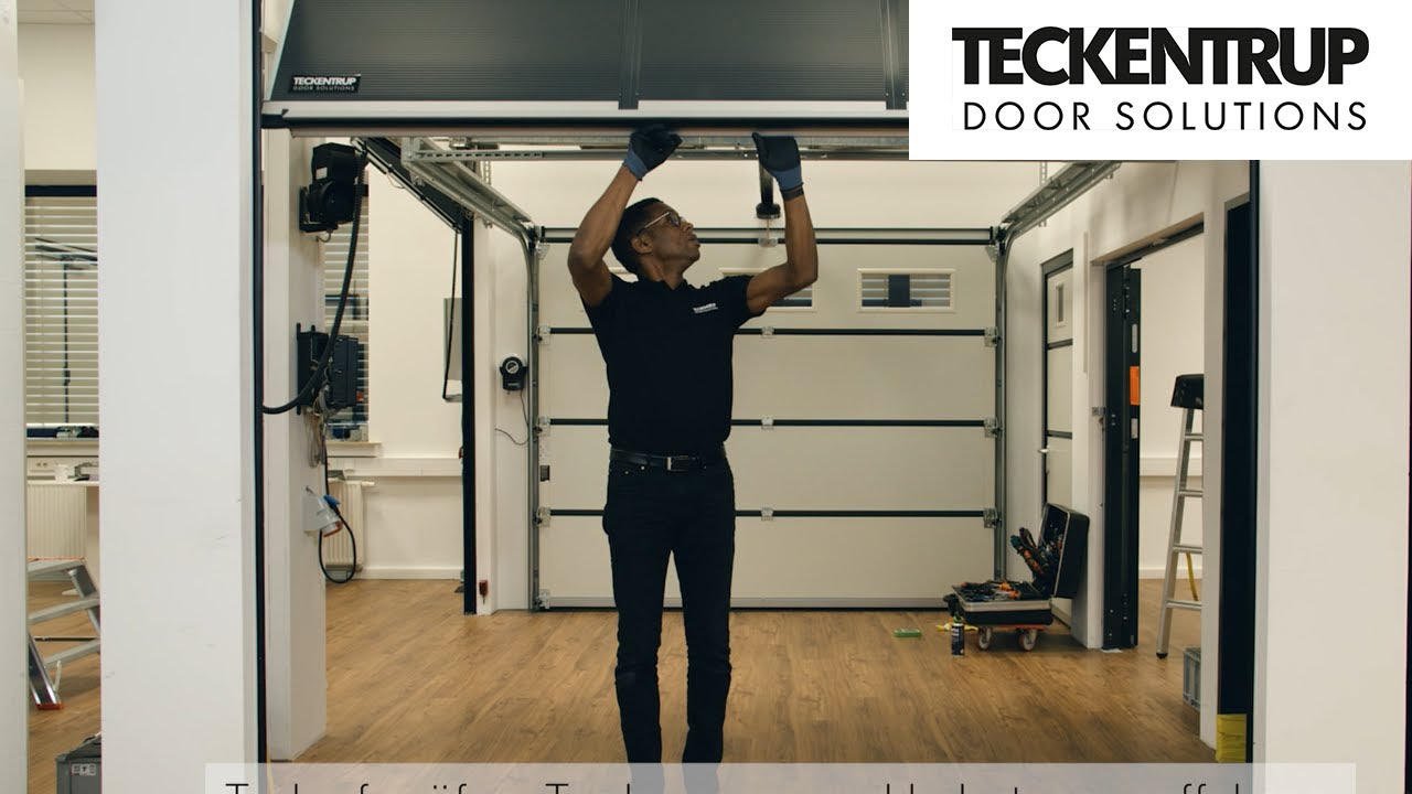 Installation of wicket door for sectional door - YouTube