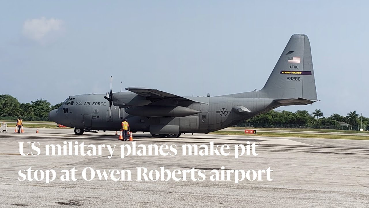 US military planes make pit stop at Owen Roberts airport - YouTube