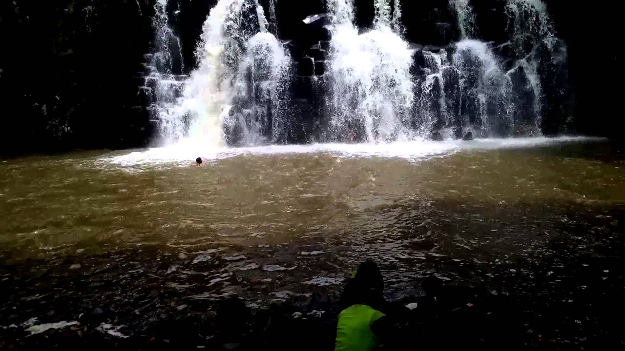 Dangerous jumping in waterfall - YouTube
