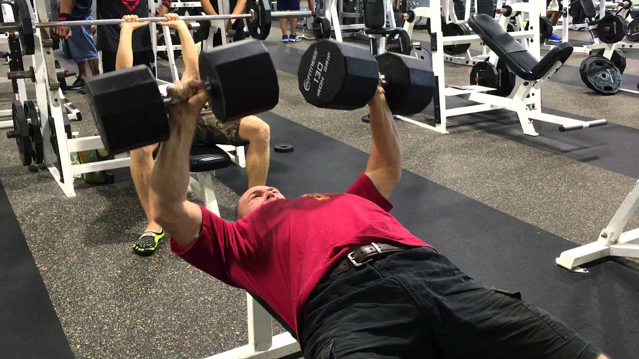40 year old vegan bench pressing the 130 pound dumbbells. - YouTube