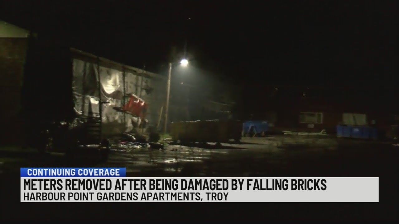 Meters removed after being damaged by falling bricks - YouTube