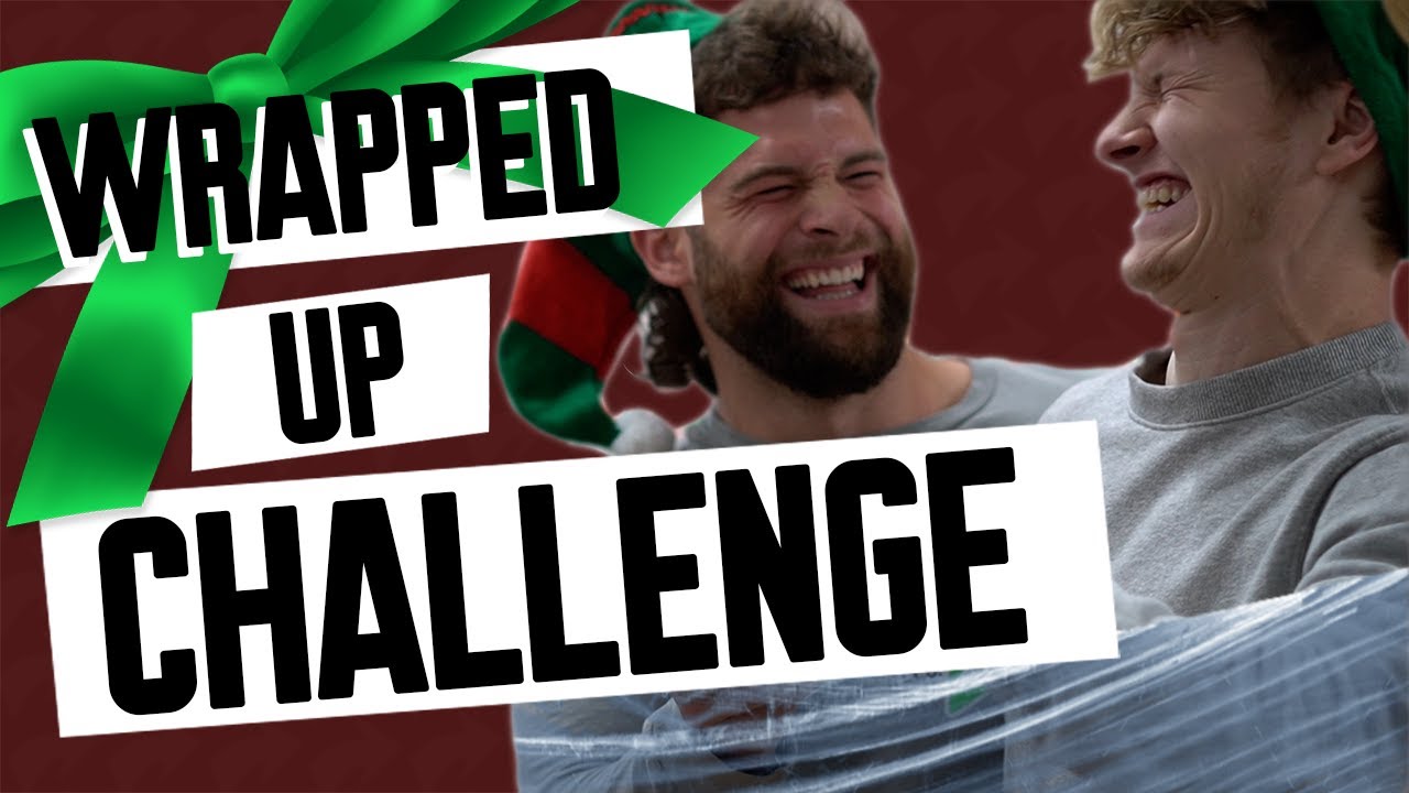 Trying to Wrap Gifts While We're Wrapped Together! - YouTube