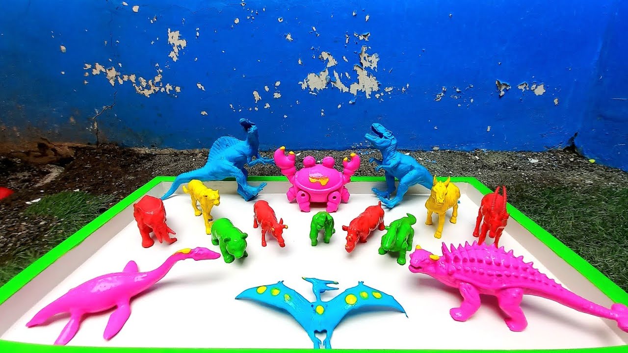 Cleaning the muddy animal toys: Spinosaurus, Plesiosaurus, Rhino ...
