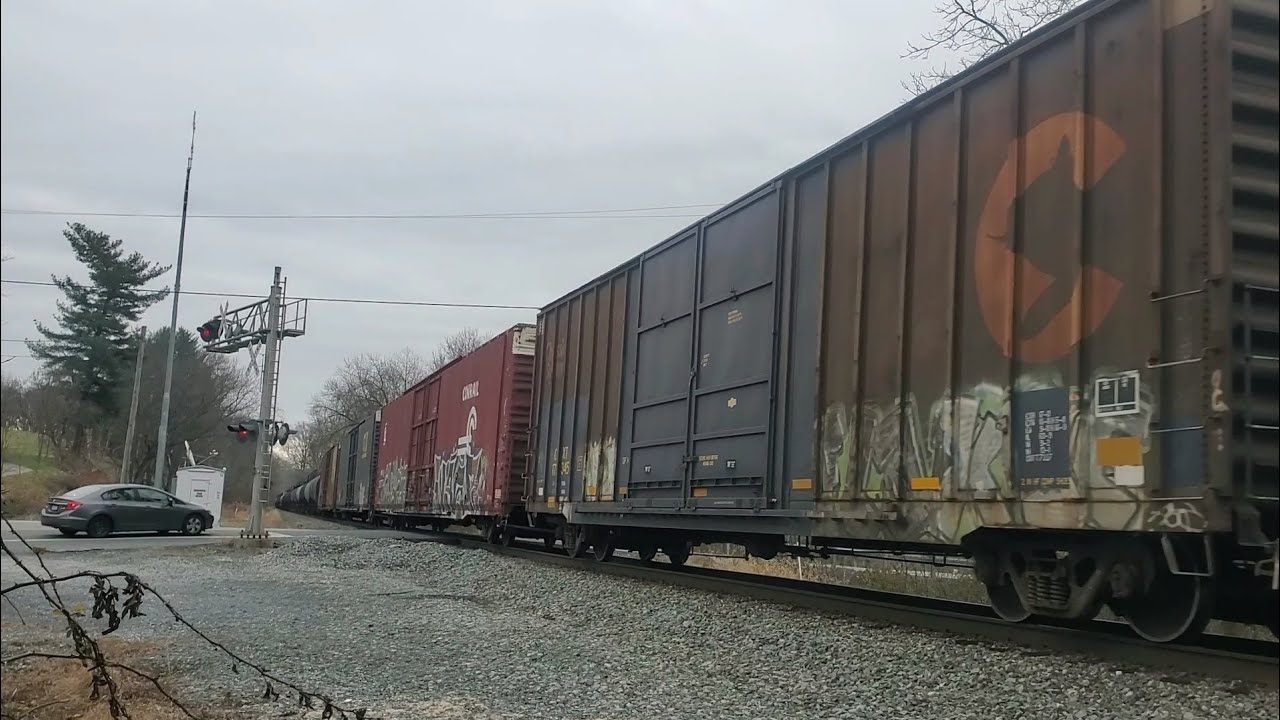 CSX M372 mix freight with a Chessie, Conrail & Wisconsin central ...