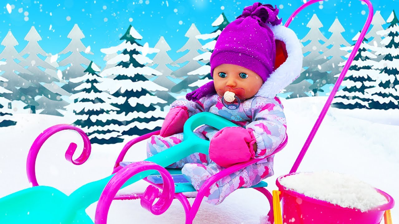 A NEW sledge for the baby doll! Baby Annabell doll goes for a walk ...